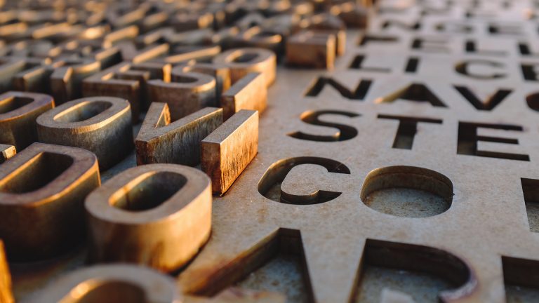 Seascape at sunset with lighthouse on the coast, seaside town of ...