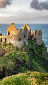 Ruins of Dunluce Castle at sunset, Northern Ireland, UK | Windows ...