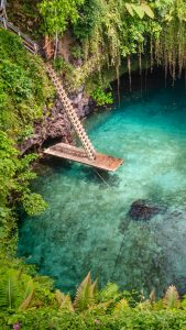 Natural pool with emerald water in the middle of tropical jungle, To ...