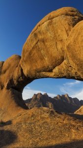 The Eye of Spitzkoppe famous natural rock arch bridge, Erongo Region ...