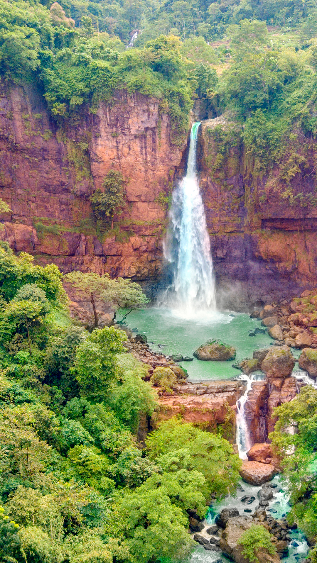 Aerial view of beautiful Cikaso waterfall with green trees at Sukabumi ...